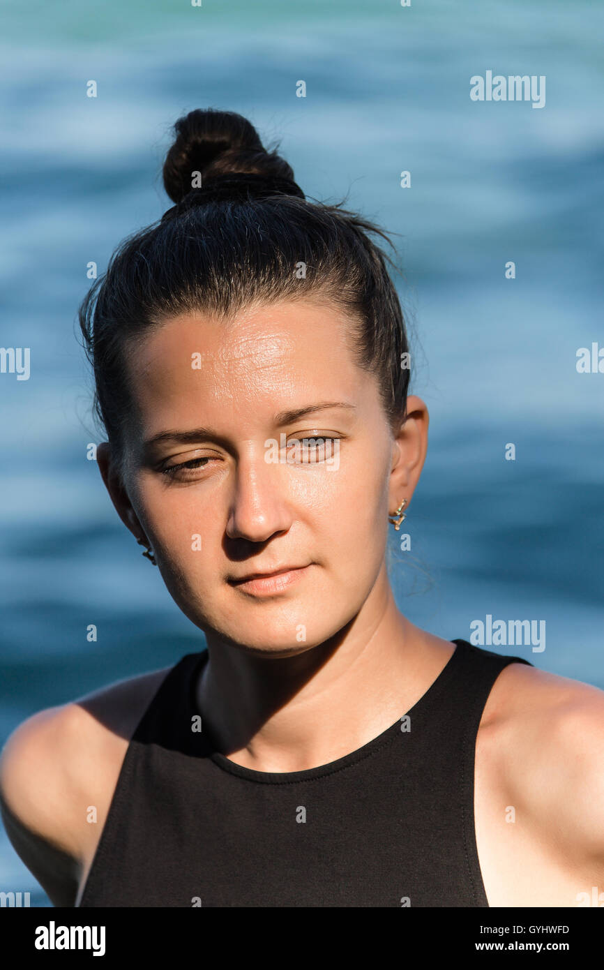 portrait of a woman on the sea background Stock Photo - Alamy