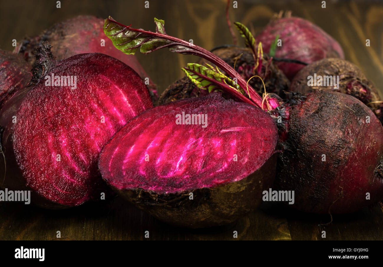 fresh red beets on a wooden background Stock Photo - Alamy