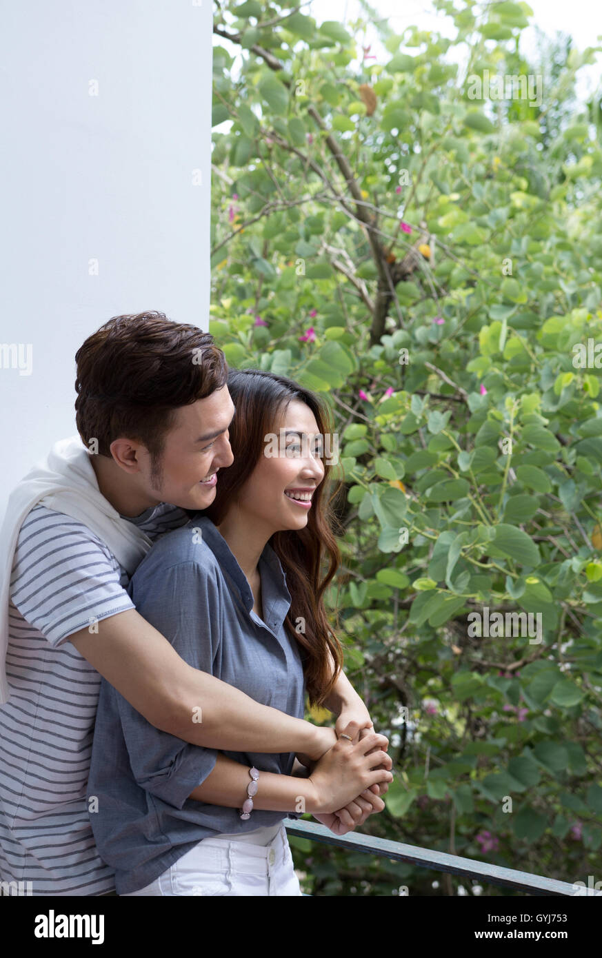 Romantic Asian couple at home Stock Photo - Alamy