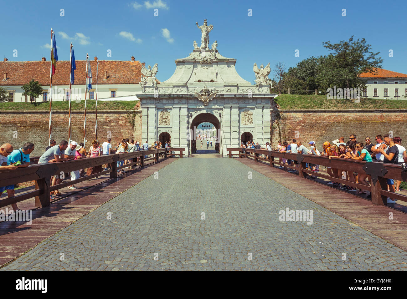Alba Iulia, Romania - July 24, 2106: Tourists wait for the changing of guards, a unique military ...