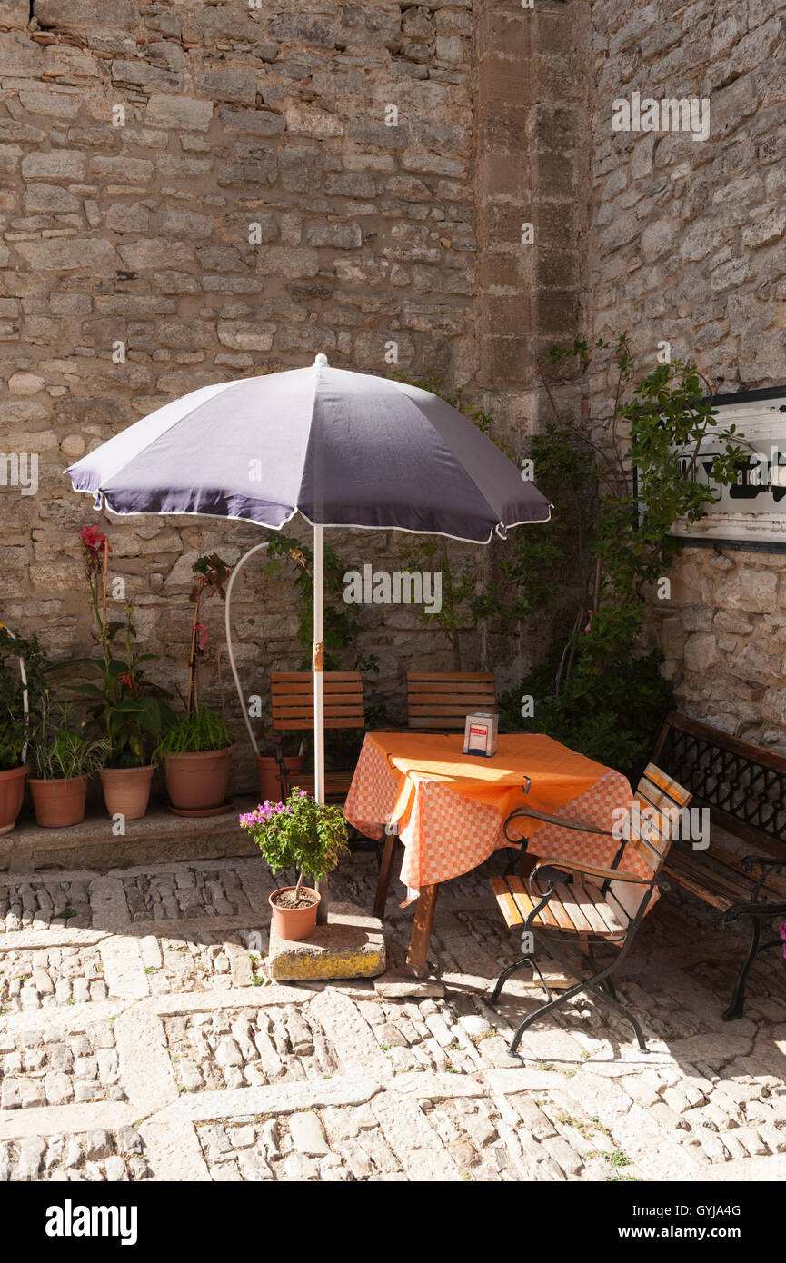 cafe table in the corner of an italian square Stock Photo - Alamy