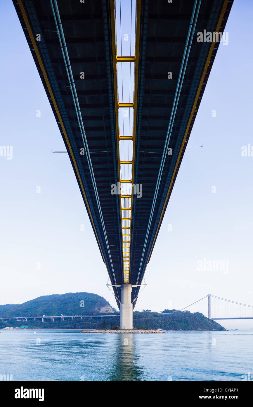 Low angle of suspension bridge in Hong Kong Stock Photo - Alamy