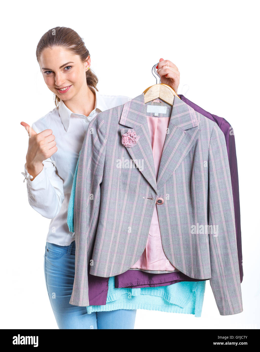 Teenage girl with clothes Stock Photo - Alamy