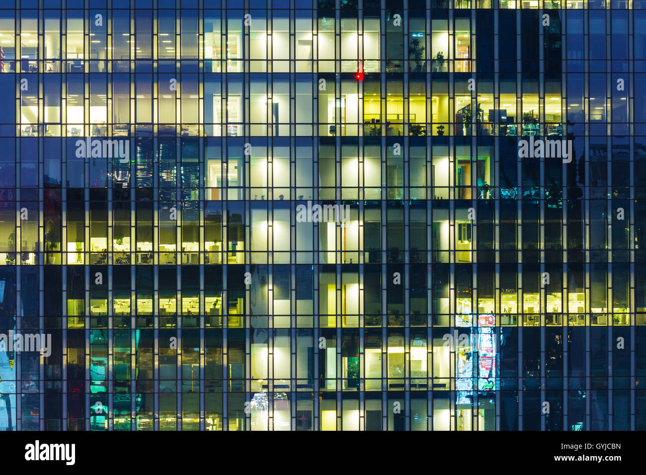 Modern office building at night Stock Photo - Alamy