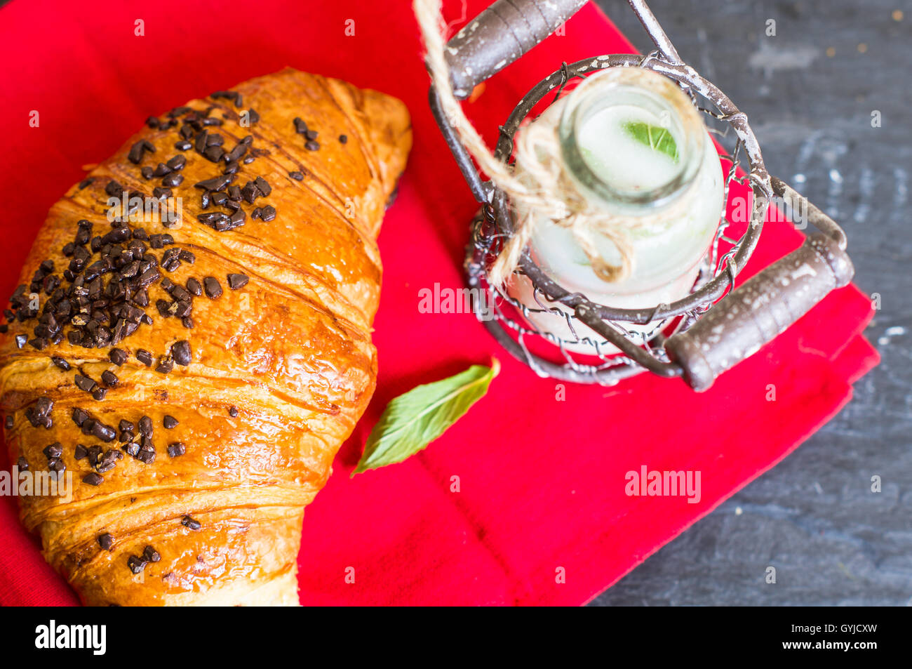 Mint milk and croissant with chocolate as a breakfast background Stock ...