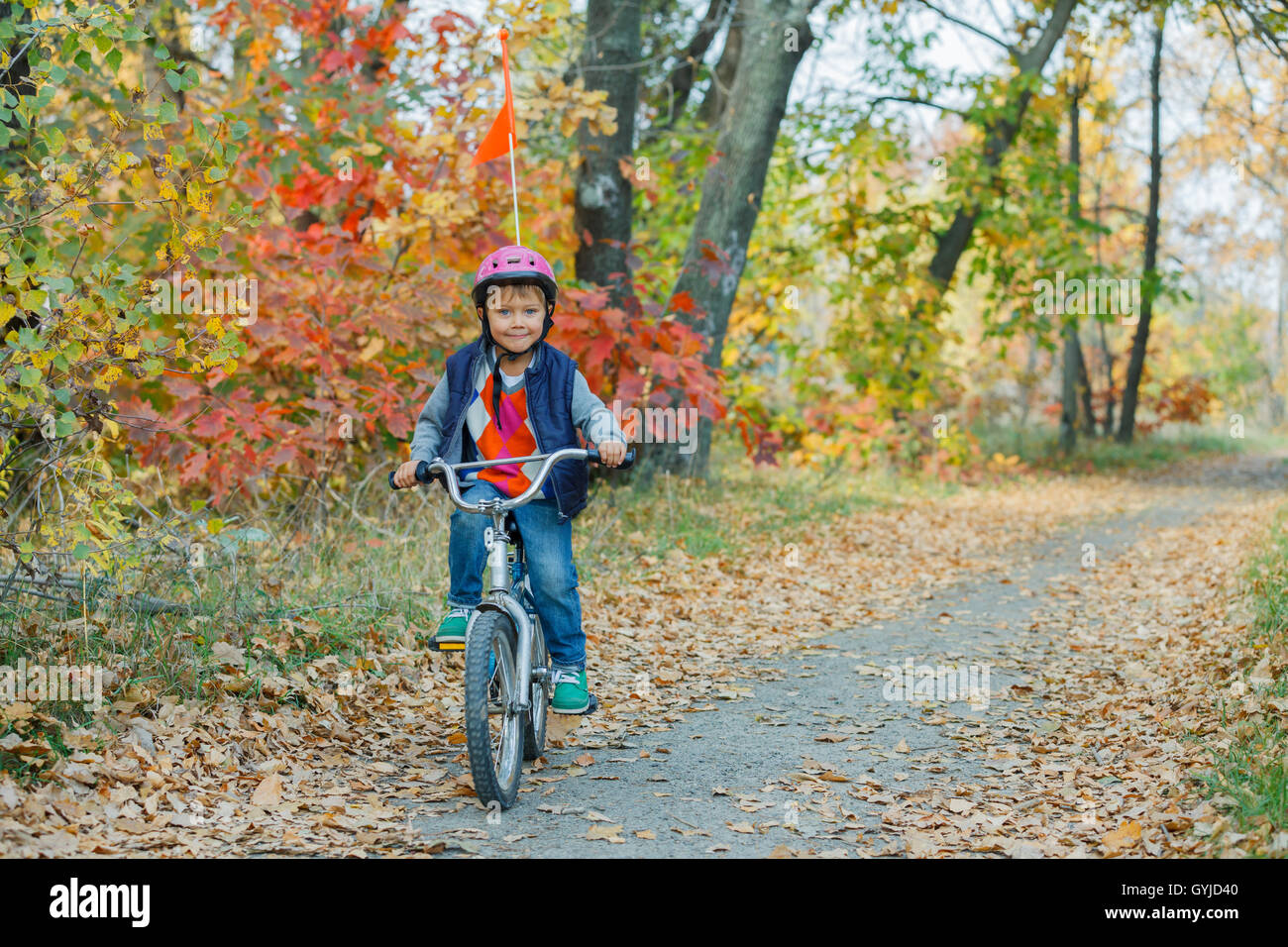 Little boy on bicycle Stock Photo - Alamy