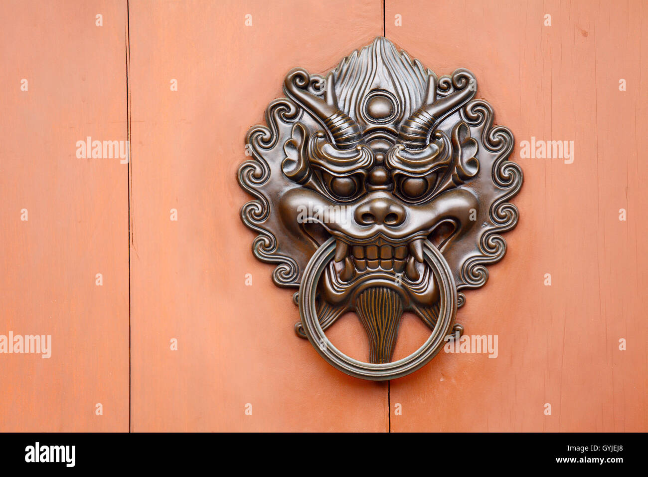 Metallic Lion statue door lock Stock Photo - Alamy