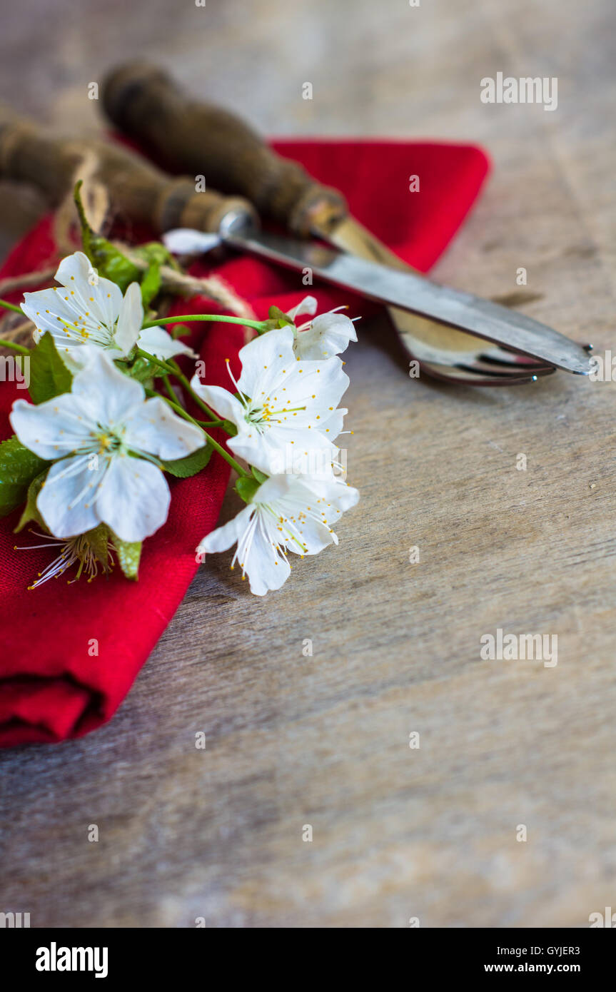 Spring time table setting with cherry blossom and vintage silverware on ...