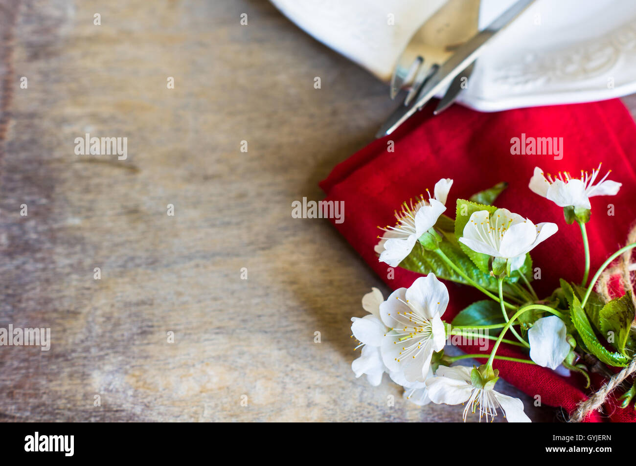 Spring time table setting with cherry blossom and vintage silverware on ...