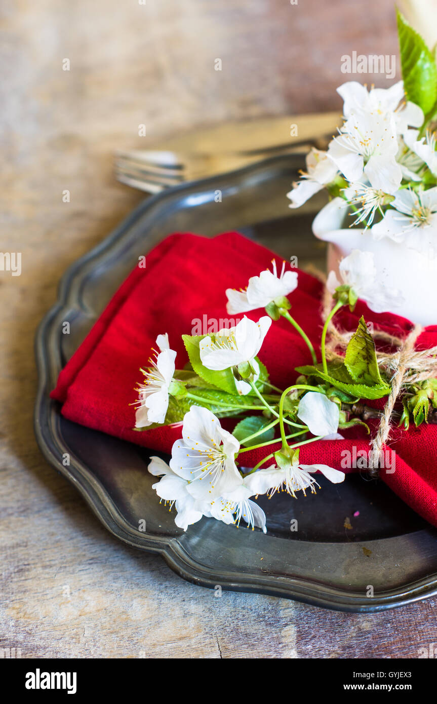 Spring time table setting with cherry blossom and vintage silverware on ...