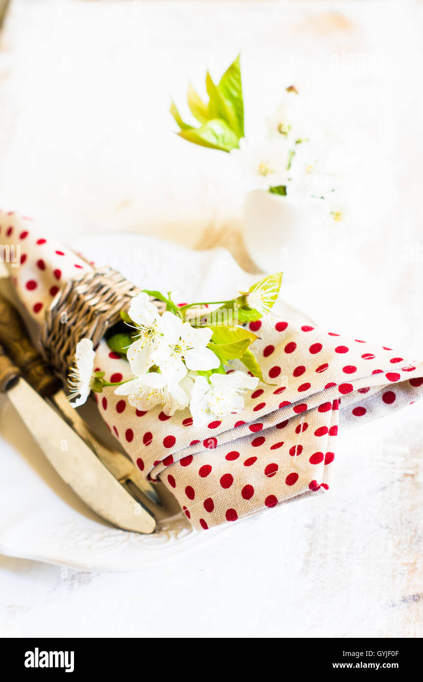 Spring time table setting with cherry blossom and vintage silverware on ...