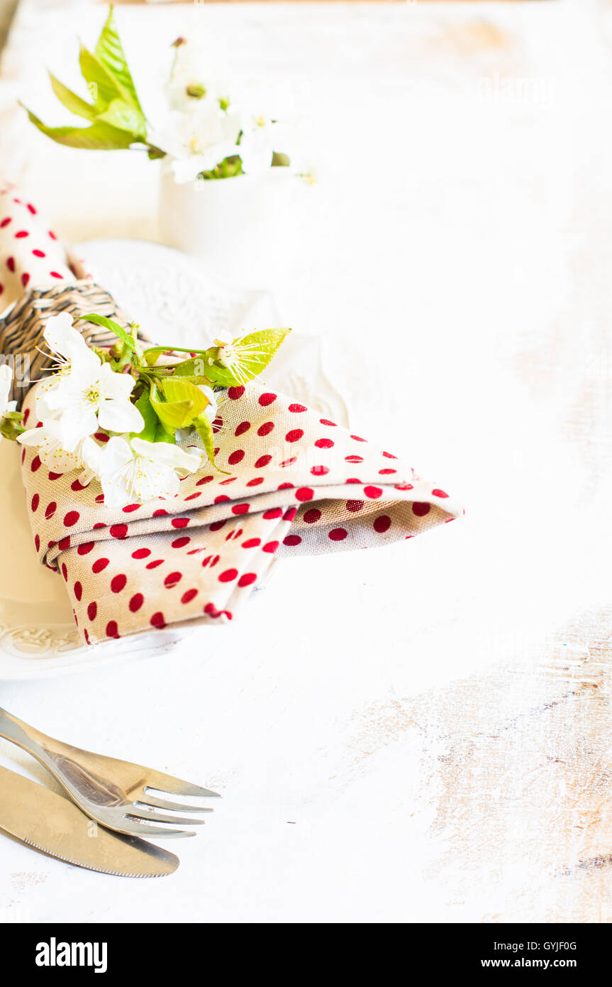 Spring time table setting with cherry blossom and vintage silverware on ...