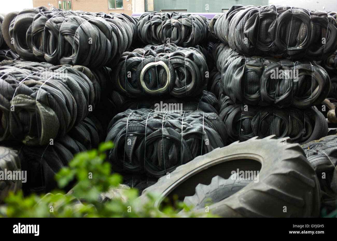 Old tyres ready to be recycled Stock Photo - Alamy