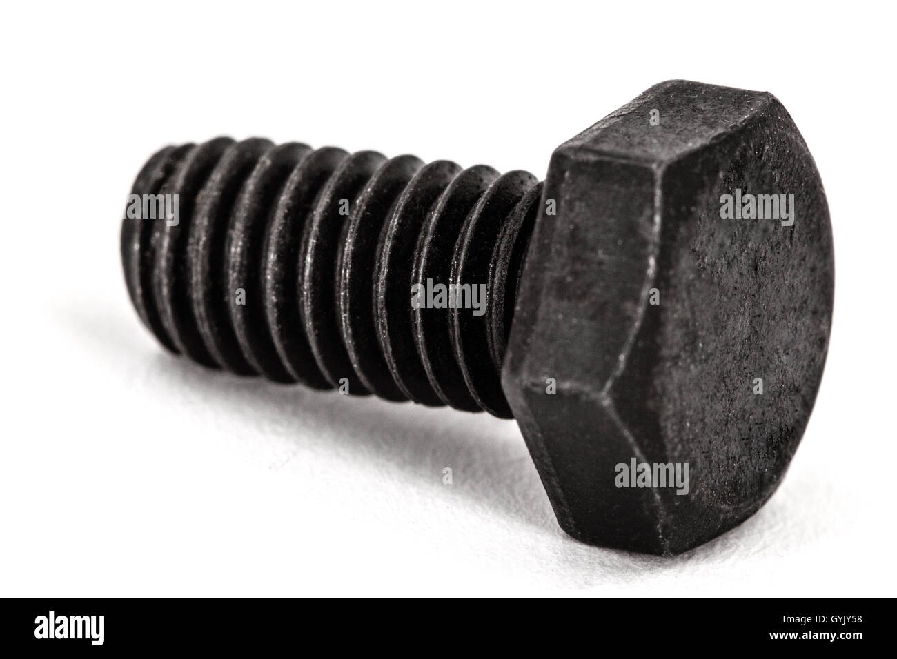 Hardened screw close-up, isolated on white background Stock Photo - Alamy