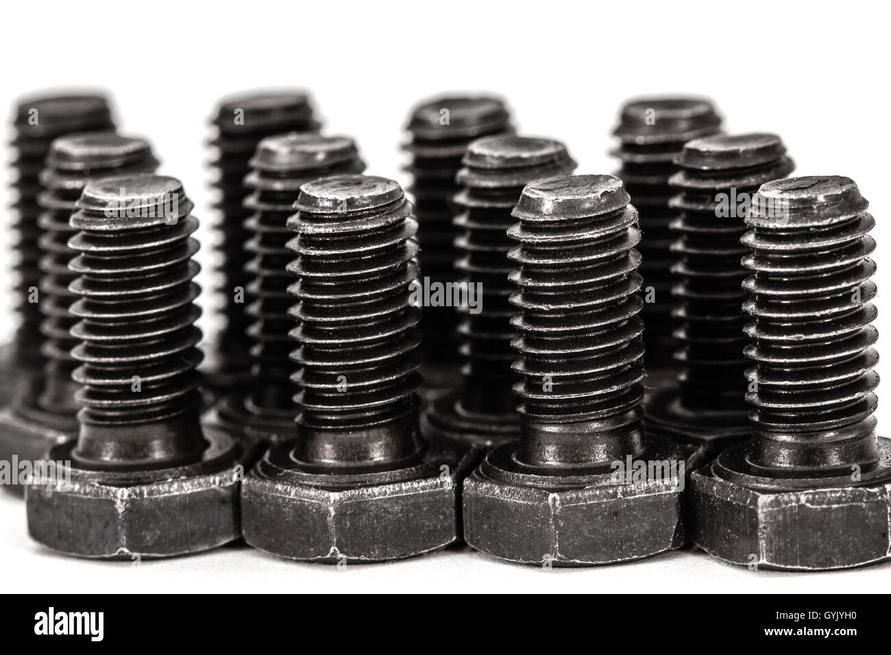 Hardened screws, isolated on white background Stock Photo - Alamy