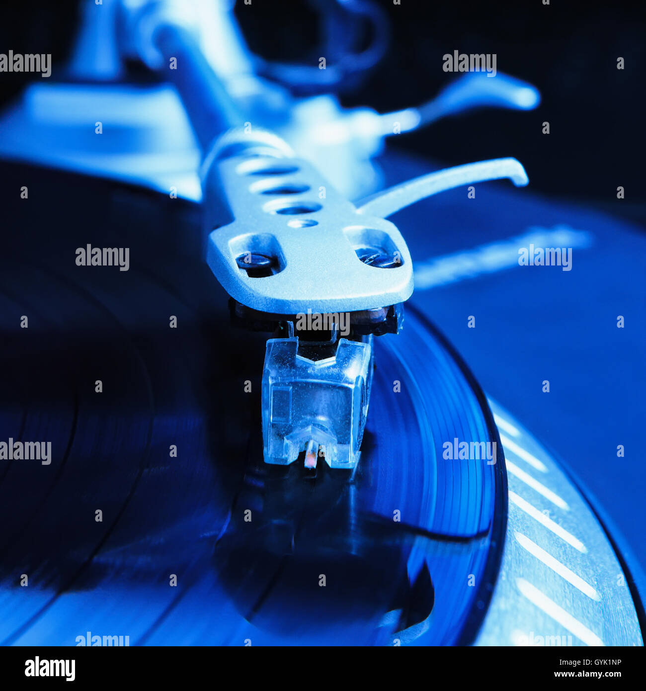 Turntable playing vinyl record with music. Useful equipment for DJ ...