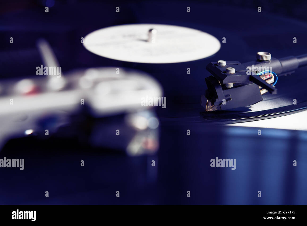 Turntable player with musical vinyl record. Useful for DJ, nightclub ...