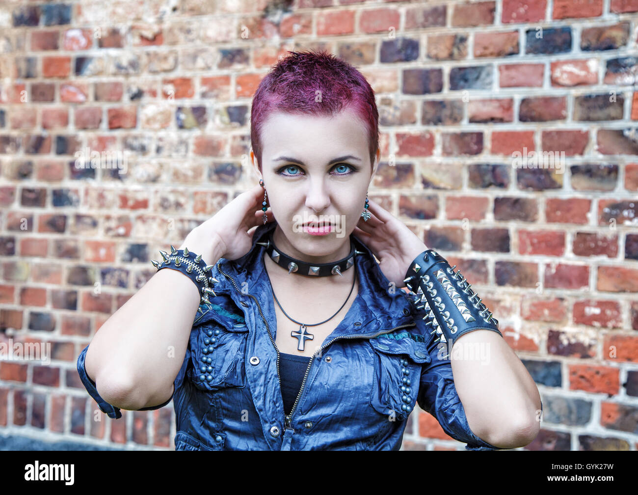 portrait of girl punk near a brick wall outdoor closeup Stock Photo - Alamy