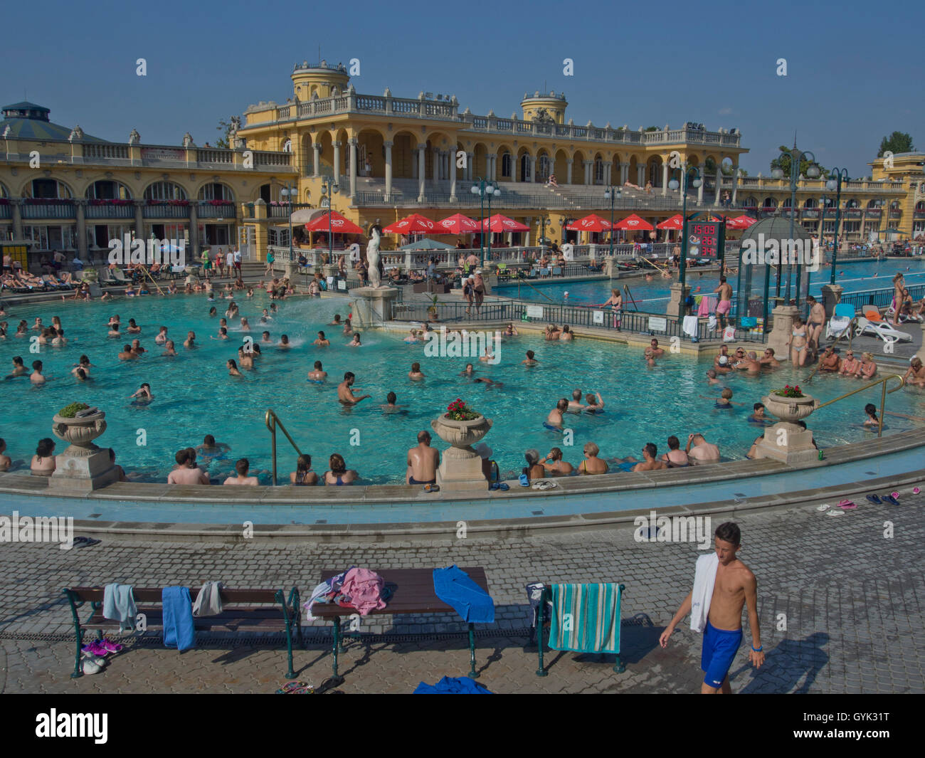 People enjoy the outdoor pools at the Szechenyi thermal baths.Budapest ...