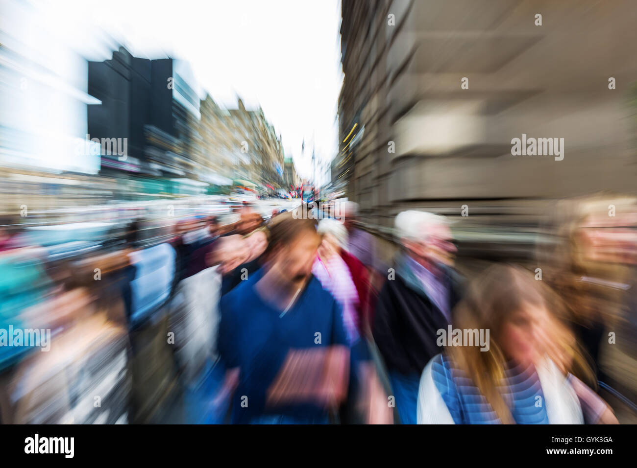 picture with creative zoom effect made by camera of a crowd of people ...