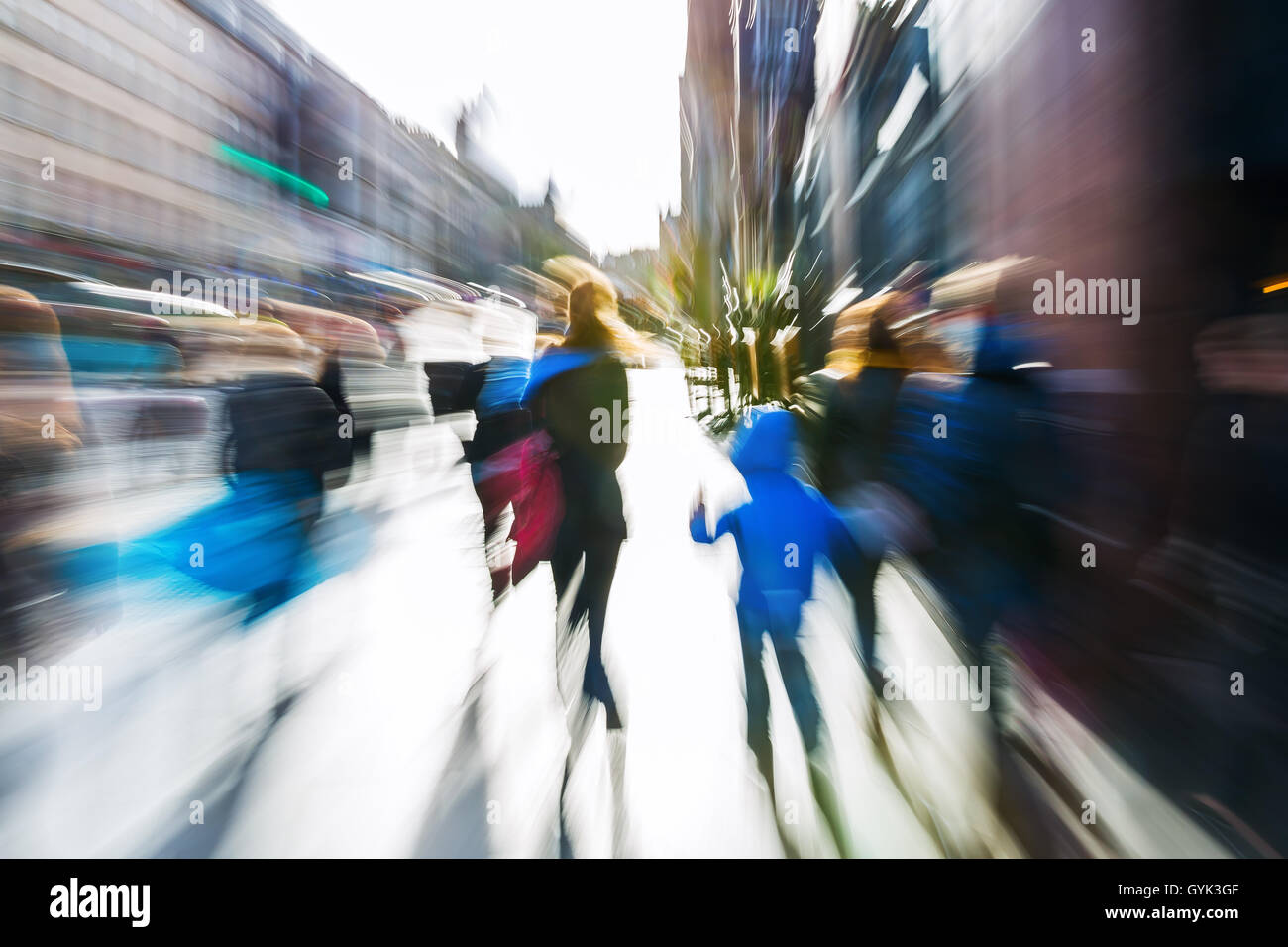 picture with creative zoom effect made by camera of a crowd of people ...