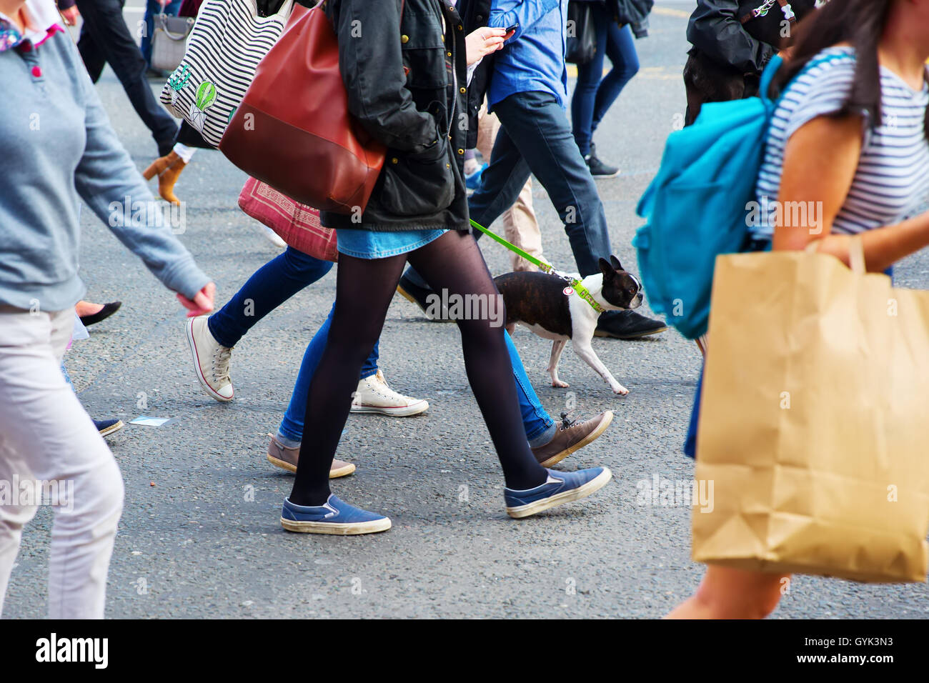 crowd of people crossing a street in the city Stock Photo - Alamy