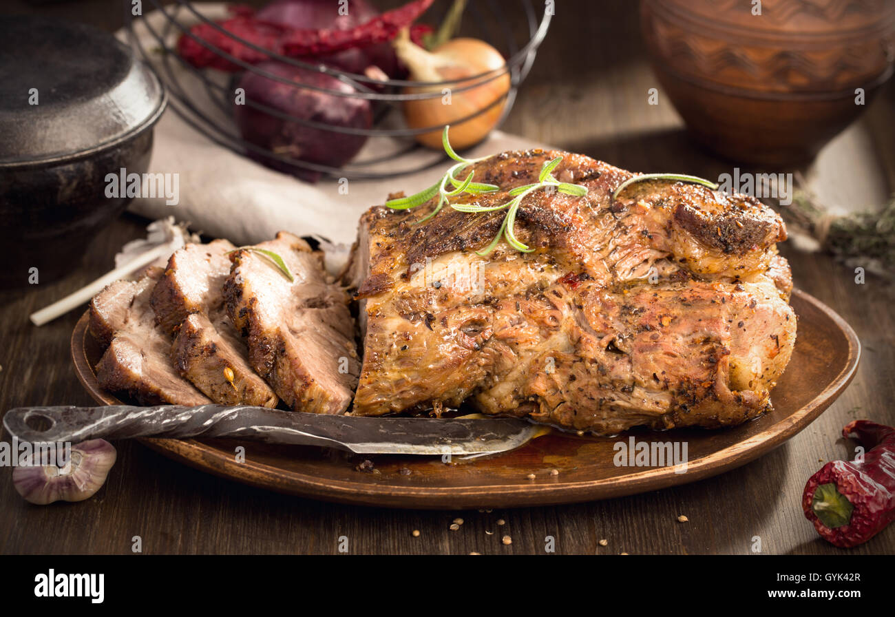 Sliced roasted pork rustic Stock Photo - Alamy