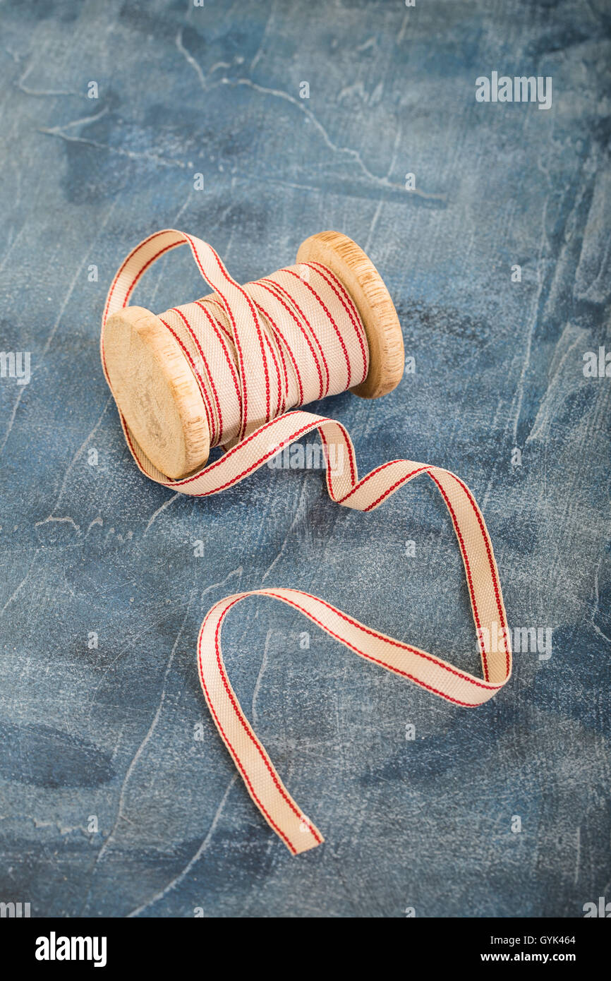 Spool of decorative ribbon Stock Photo - Alamy