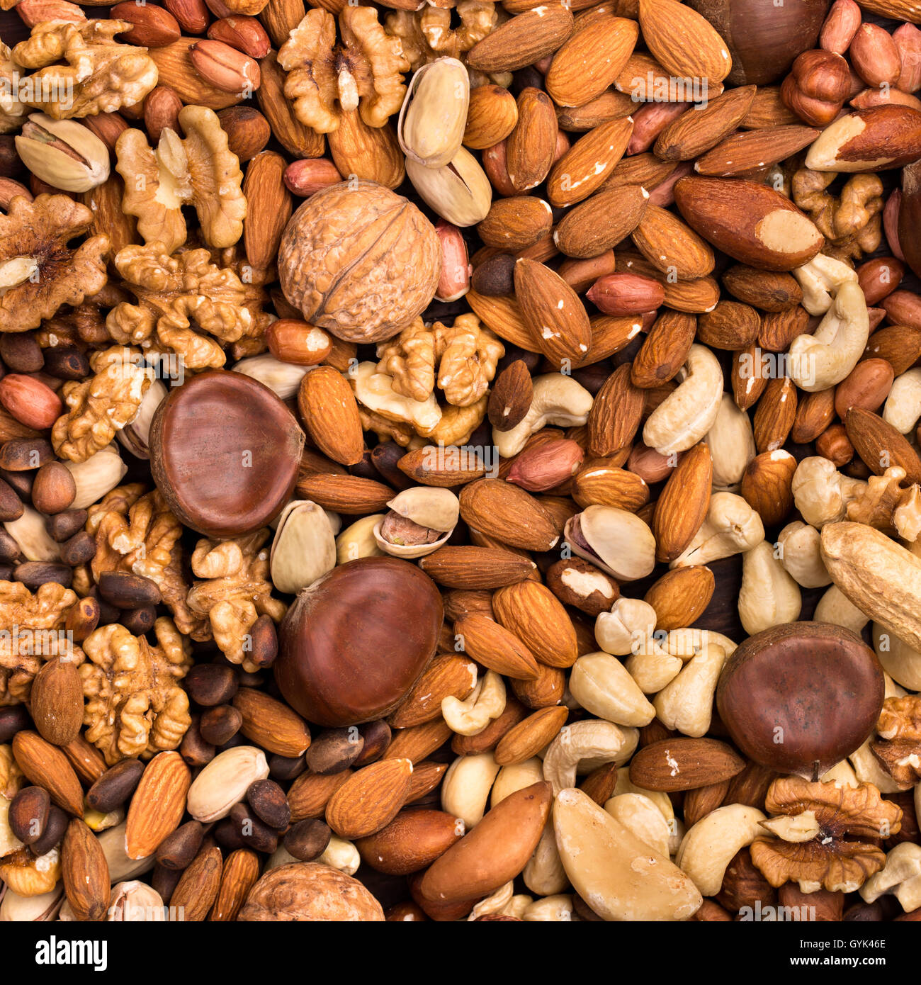 Square nut background Stock Photo - Alamy