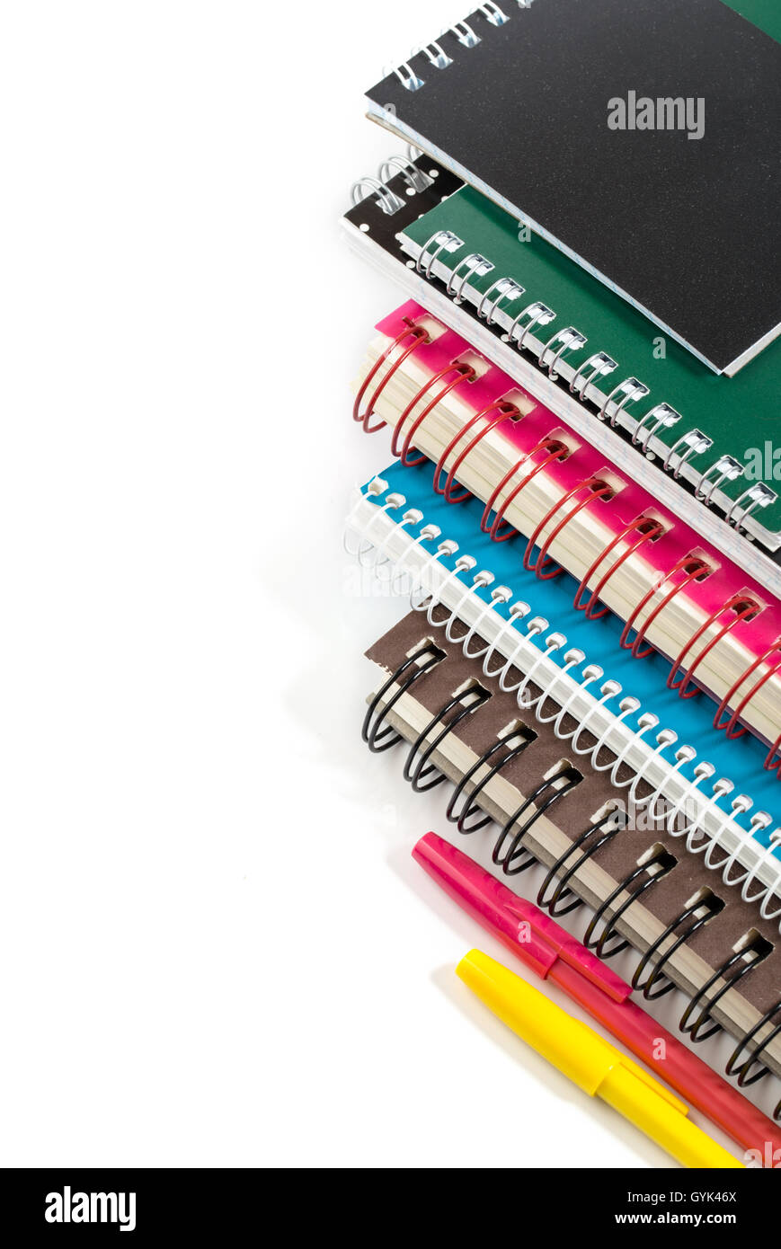 Stack of notebooks on white background with copy space Stock Photo - Alamy