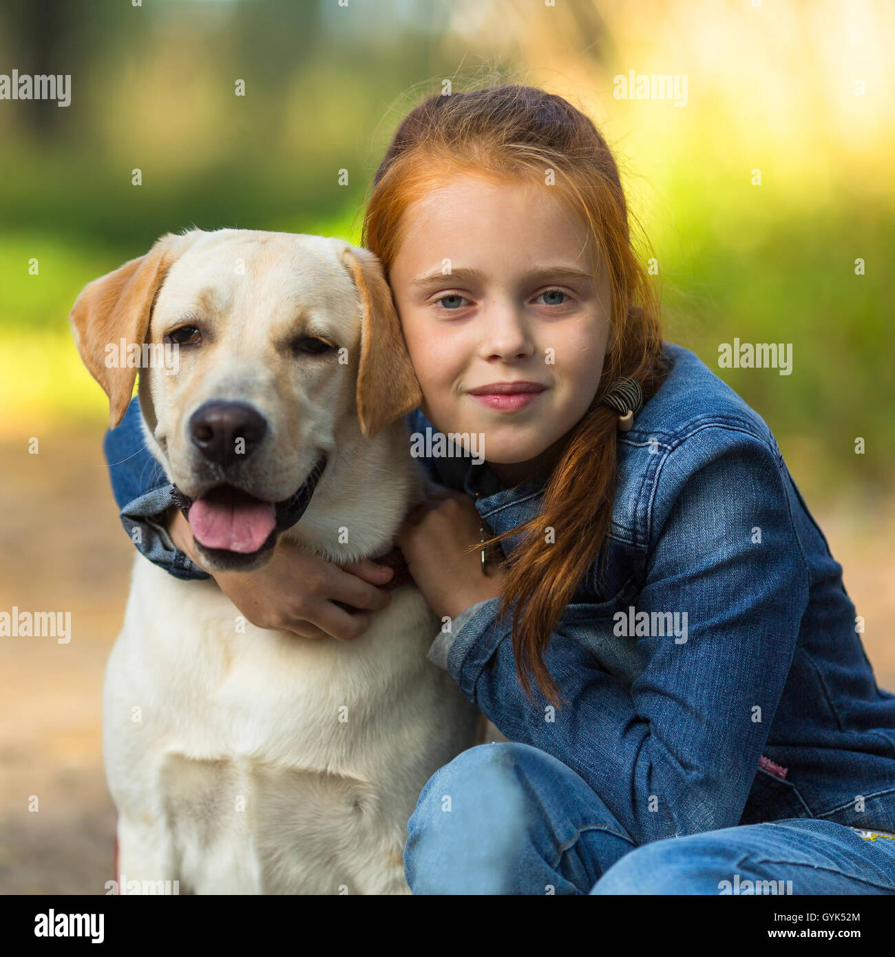 Ten years girl with her dog Stock Photo - Alamy
