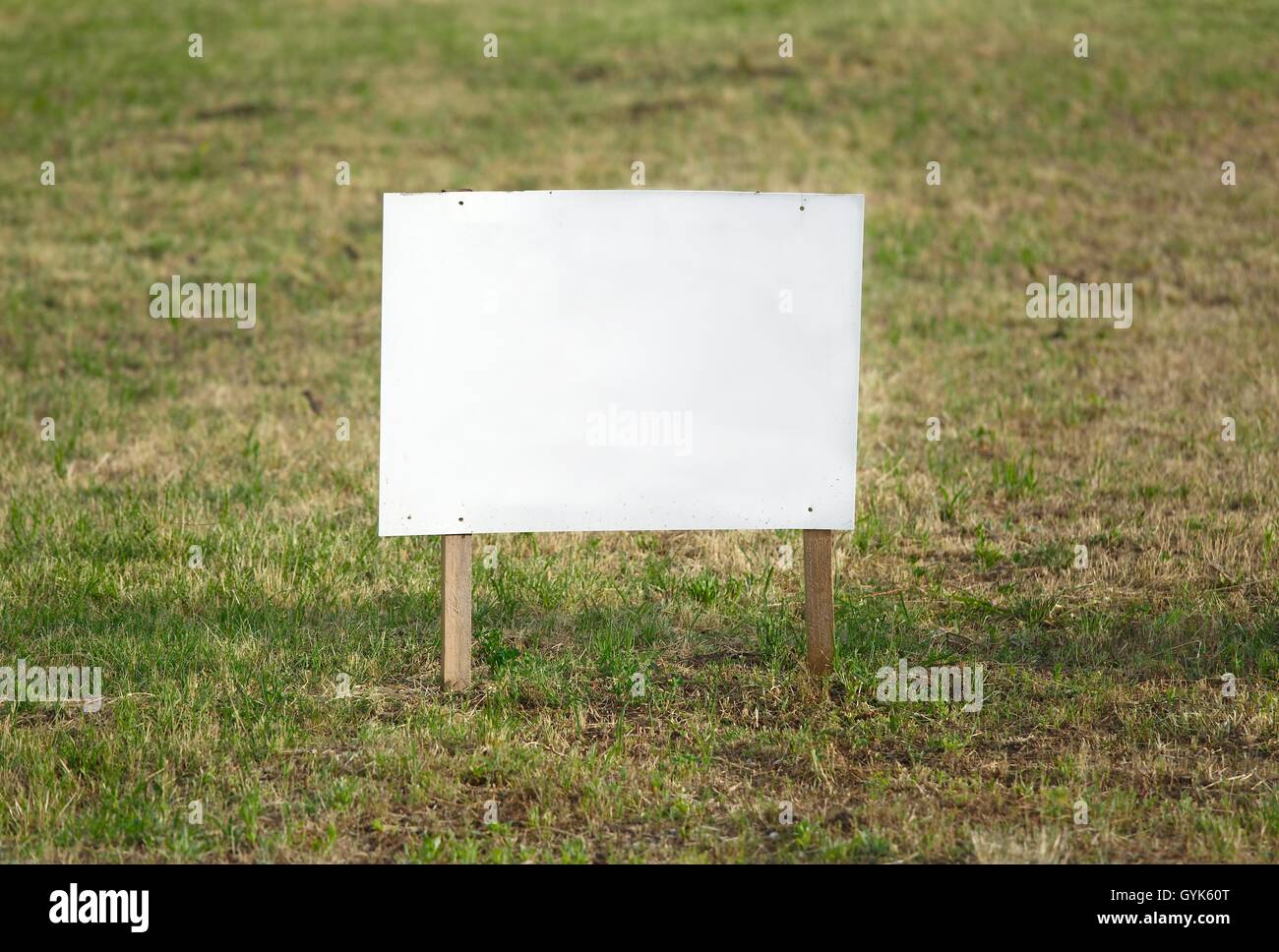 Empty sign on a land Stock Photo - Alamy