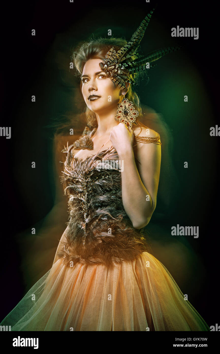 Girl harpy. Creative makeup for Halloween. The concept of magic ...