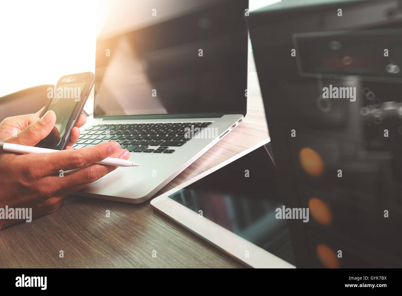 Double exposure of business man hand working on blank screen laptop ...