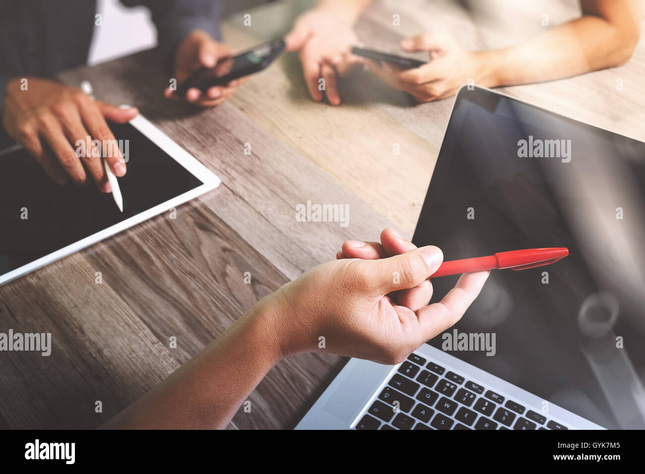 Team work concept,businessman hand attending video conference in modern ...