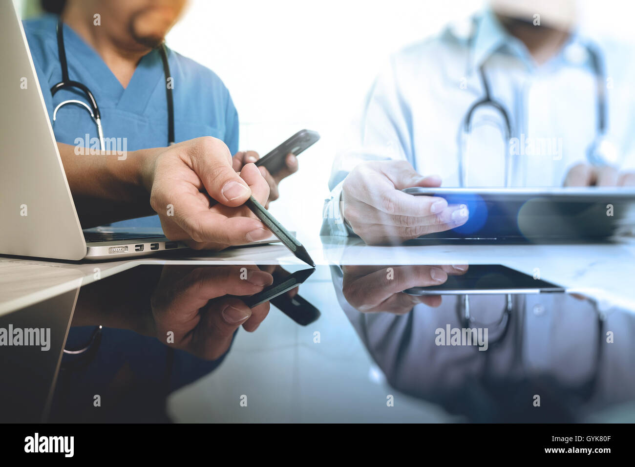 Medical technology network team concept. Doctor hand working with smart ...