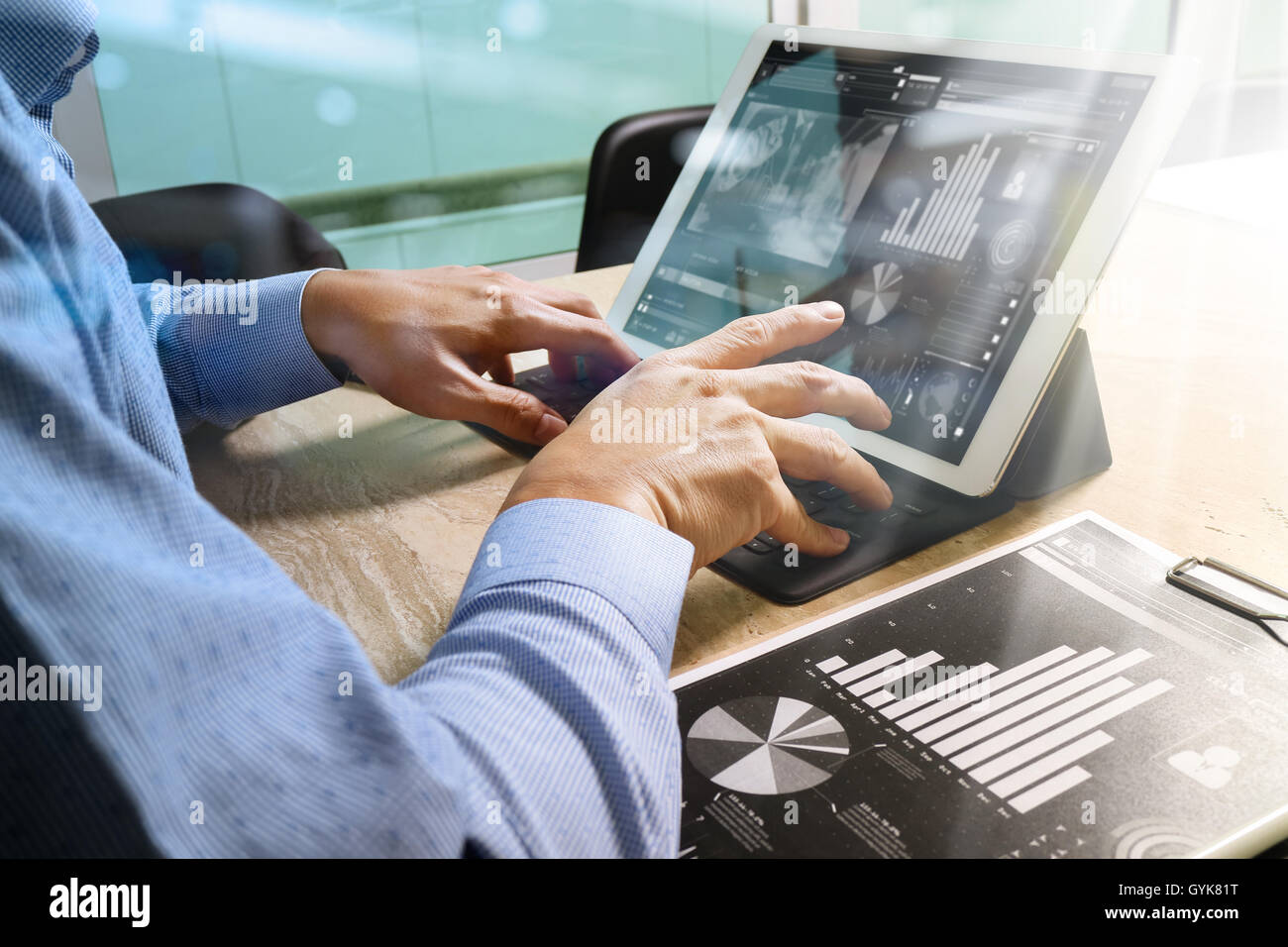 Businessman hand working concept. Documents finance graphic chart ...