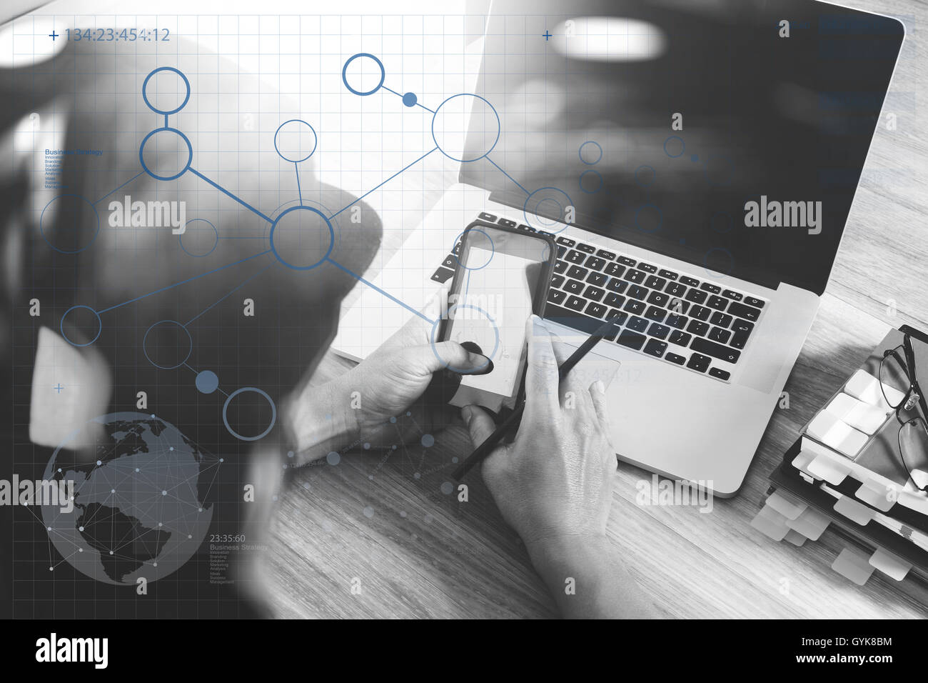 Designer hand working with laptop computer on wooden desk as responsive ...