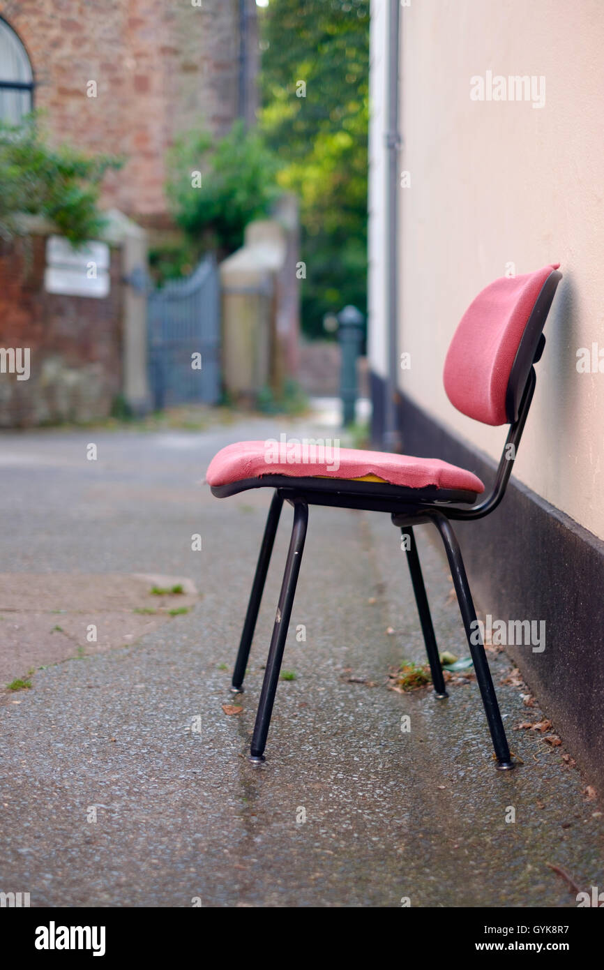 Abandoned Chair in alley Stock Photo - Alamy