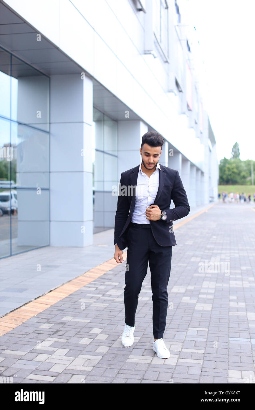 Young handsome businessman Arab Muslims is in the business center in ...