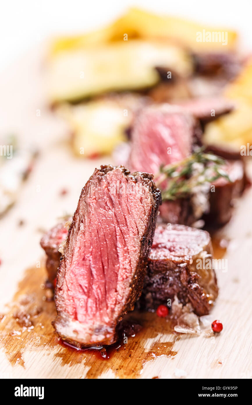 Sliced medium rare grilled Beef steak ribeye Stock Photo - Alamy Sliced medium rare grilled Beef steak ribeye Stock Photo - Alamy