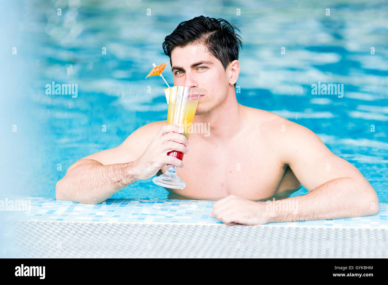 Young muscular summer hotel hi-res stock photography and images - Alamy