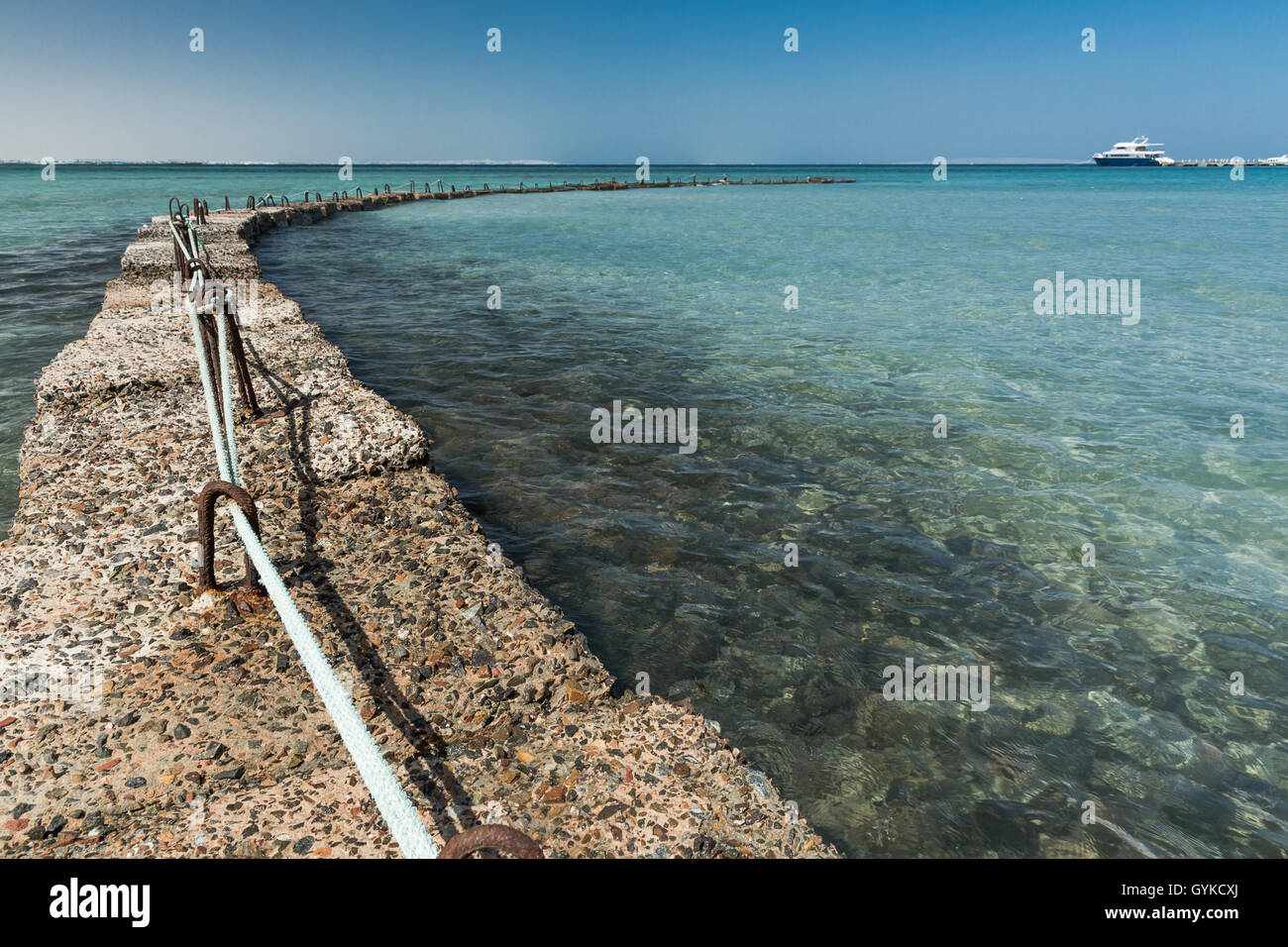 Stone breakwater in the sea Stock Photo - Alamy