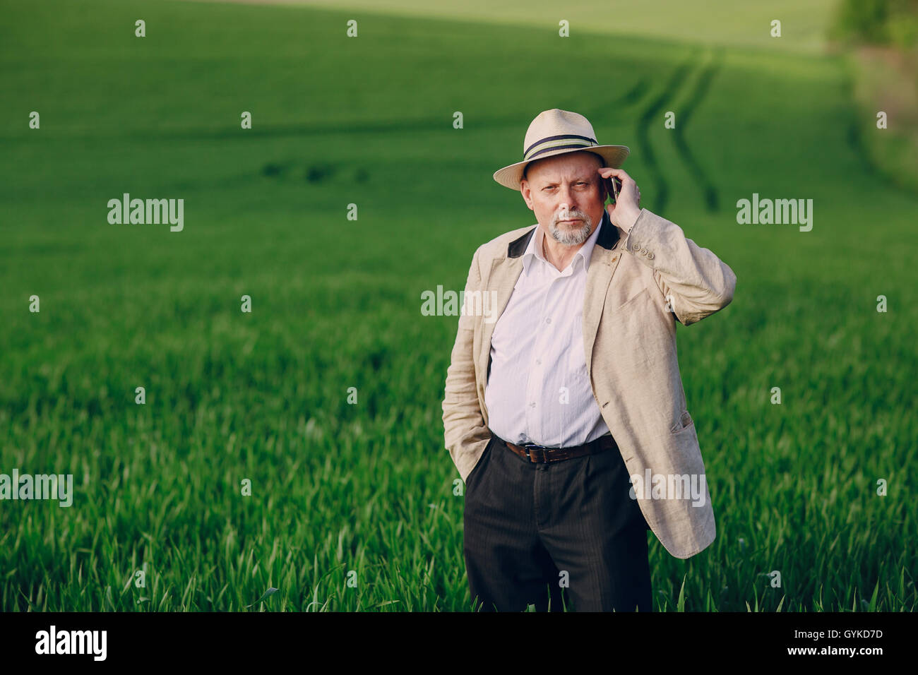 old man in field Stock Photo - Alamy