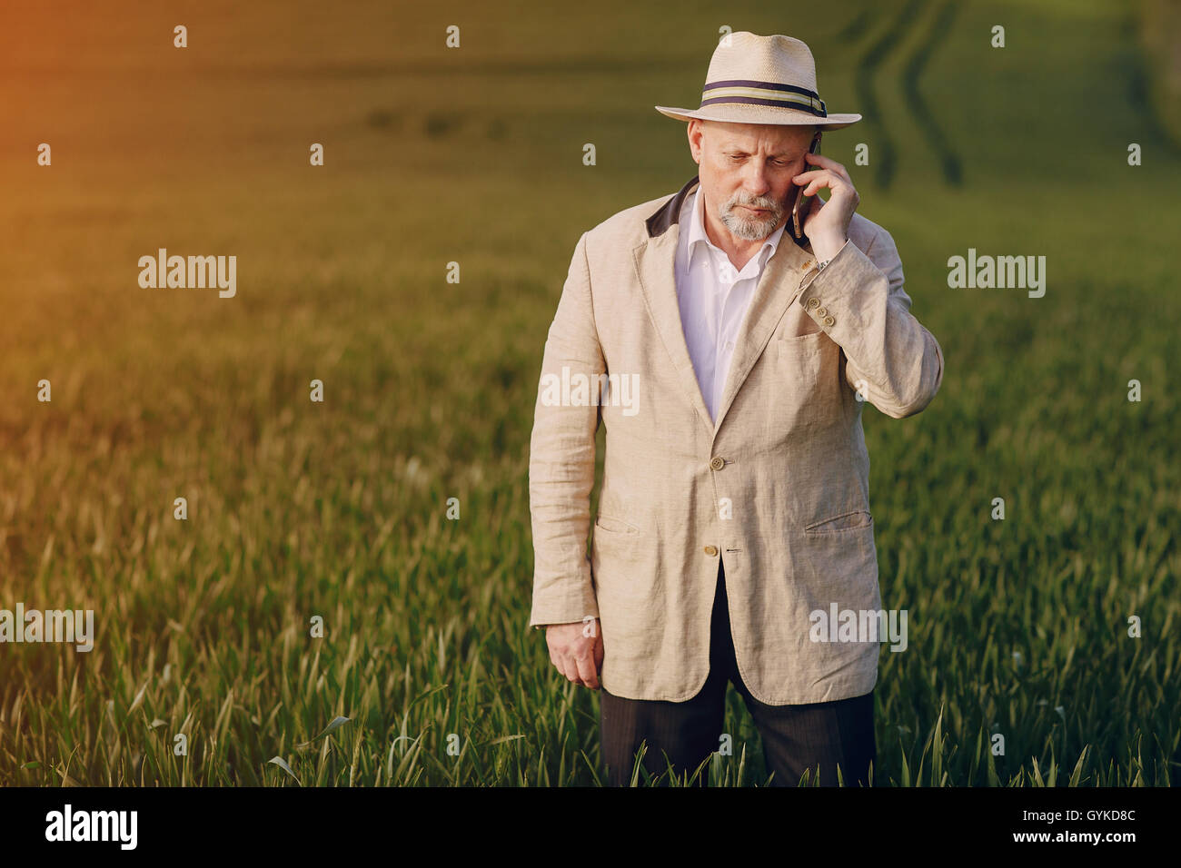 old man in field Stock Photo - Alamy