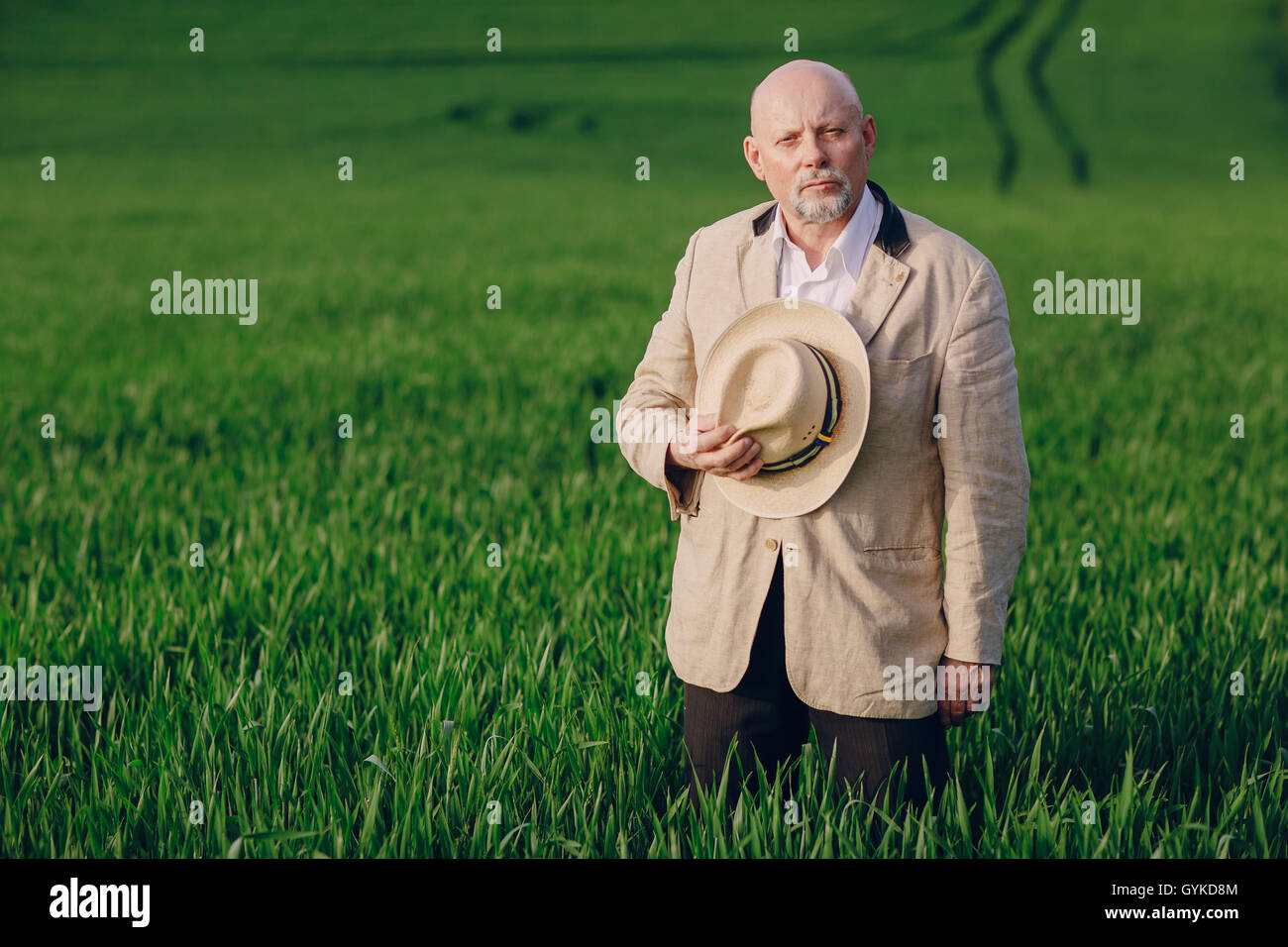 old man in field Stock Photo - Alamy