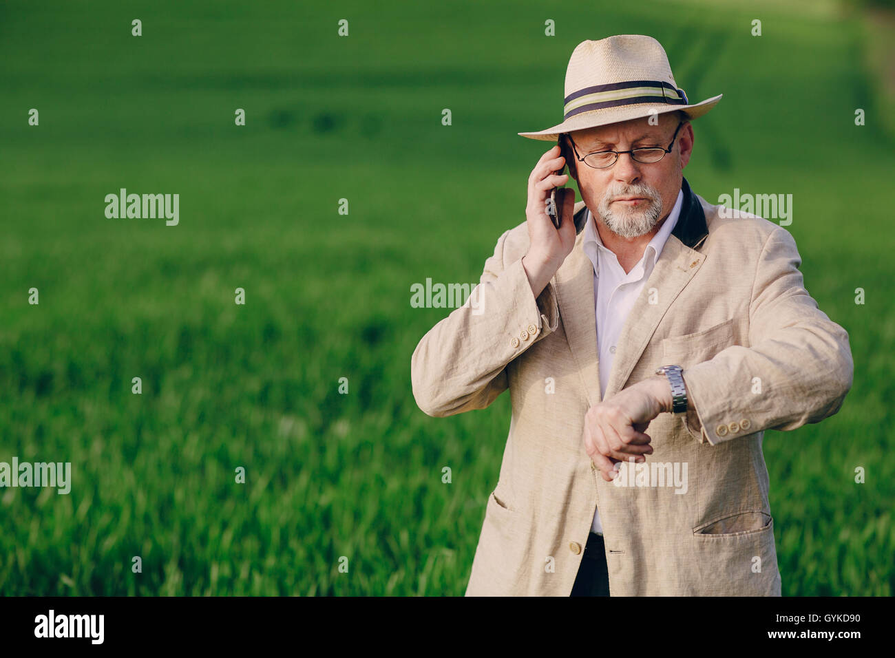 old man in field Stock Photo - Alamy