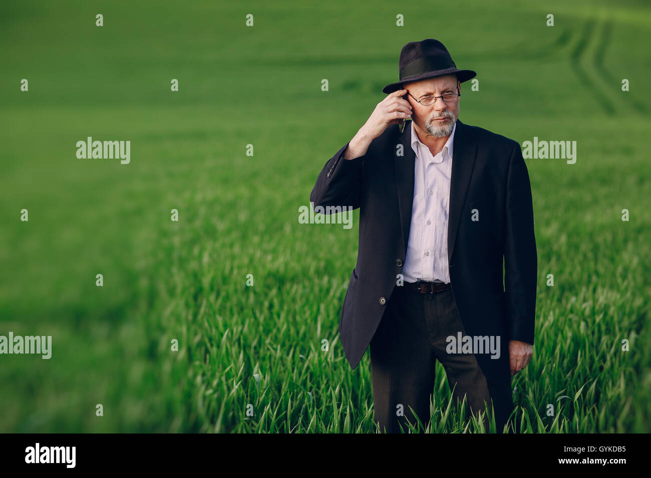 old man in field Stock Photo - Alamy