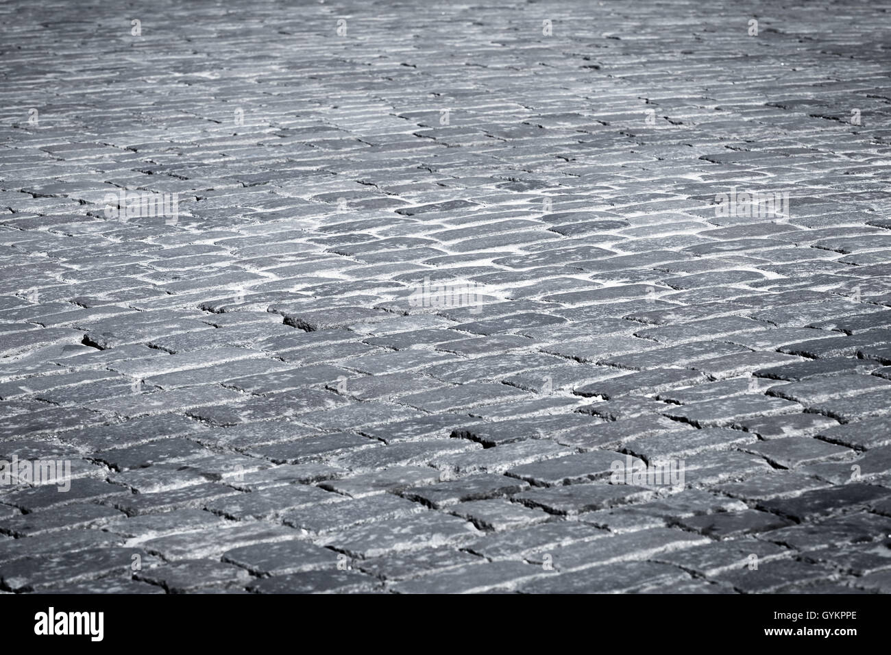 Granite old stone road texture as a background Stock Photo - Alamy