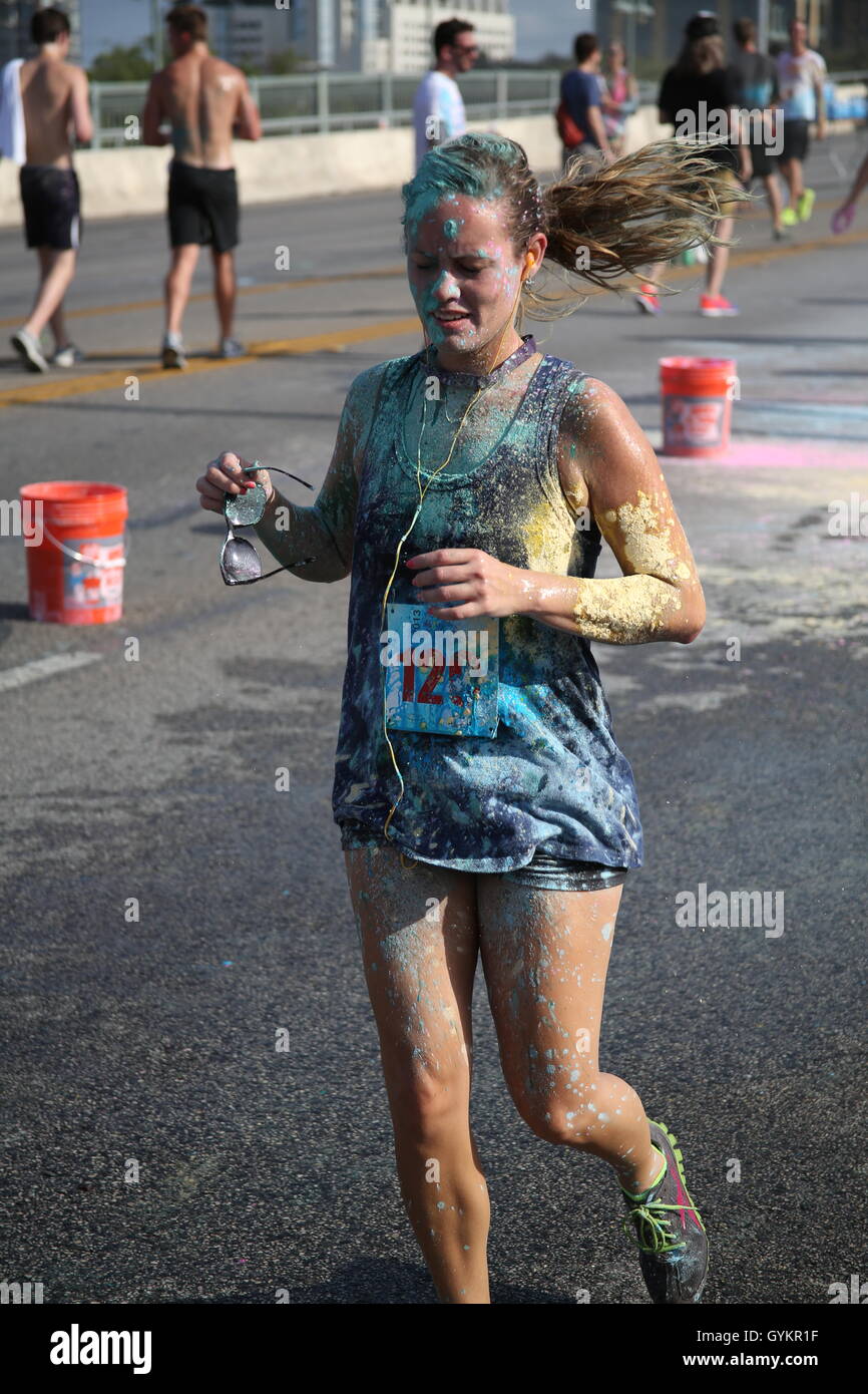 A runner finishes the Rainbow Run in Austin, Texas Stock Photo - Alamy